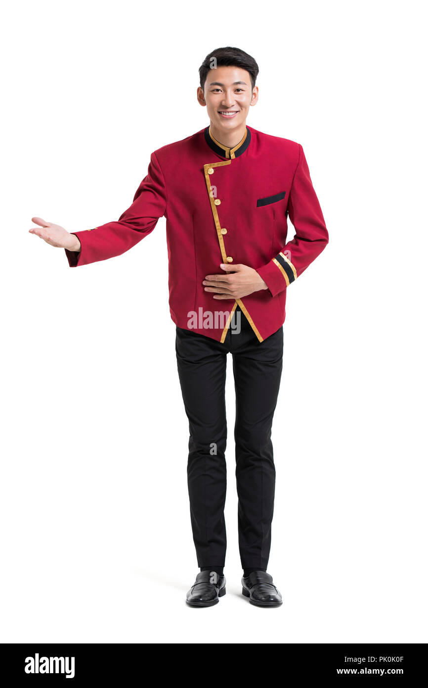 Young bellboy greeting Stock Photo - Alamy