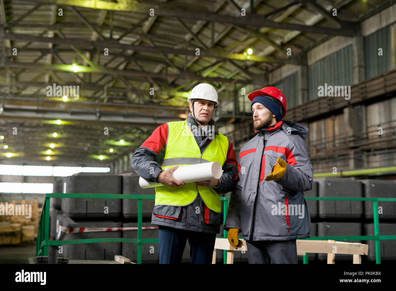 Two Workers at Plant Stock Photo - Alamy