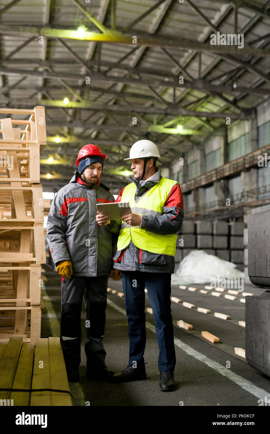Two Workers at Modern Plant Stock Photo - Alamy