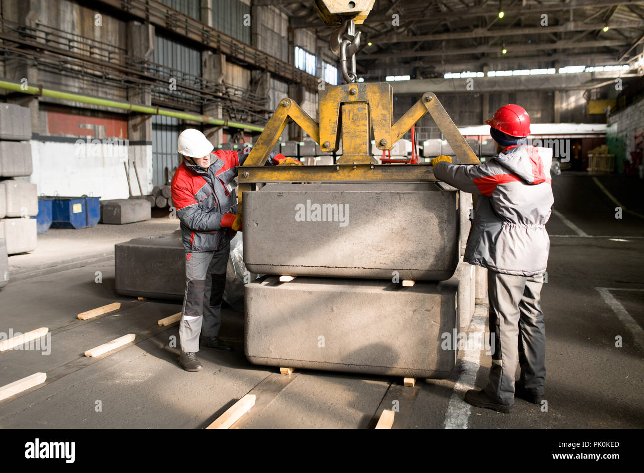 Workers Using Loading Crane Stock Photo - Alamy