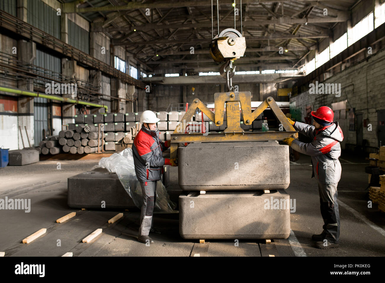 Two Workers Using Loading Crane Stock Photo - Alamy