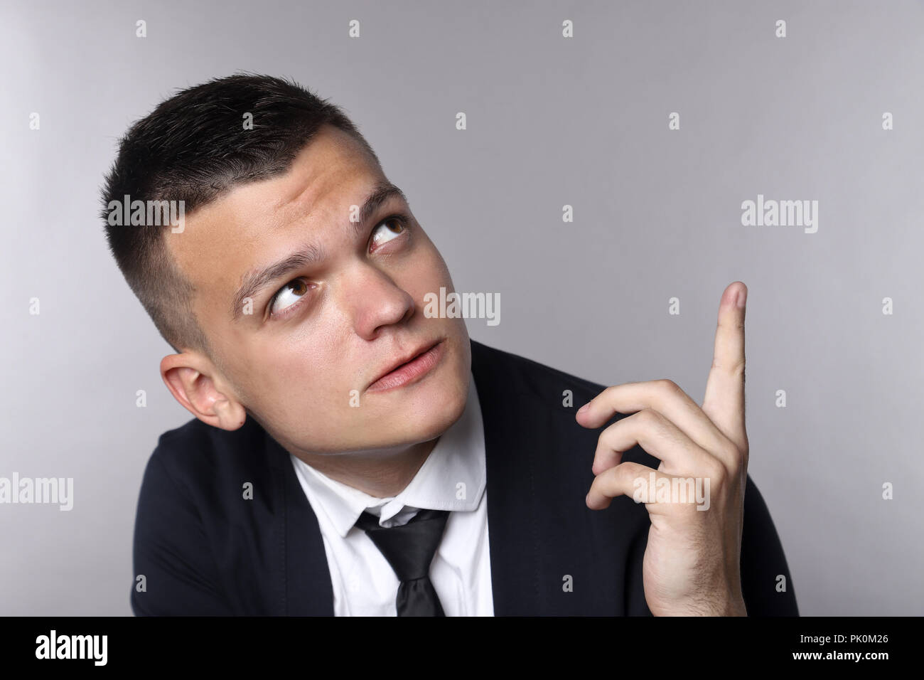 Business man pointing with finger hi-res stock photography and images ...
