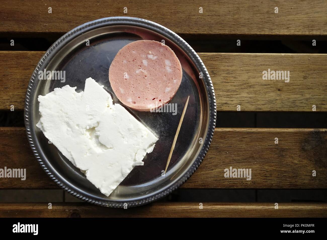 Greek Cuisine. Meze of Cretan Goats Cheese with Salami flavoured with ...