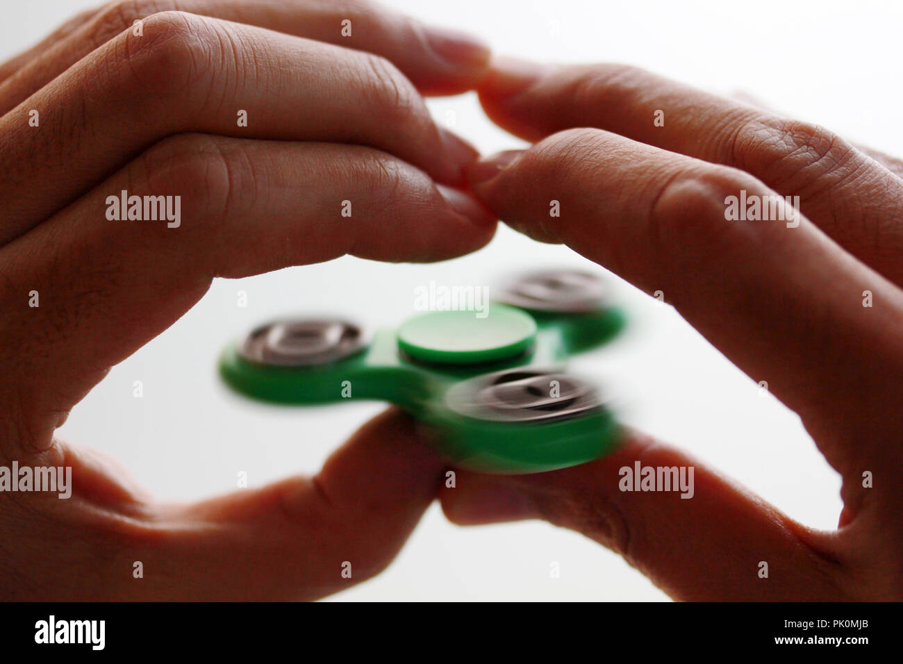 Hand spinner, fidgeting hand toy Stock Photo - Alamy