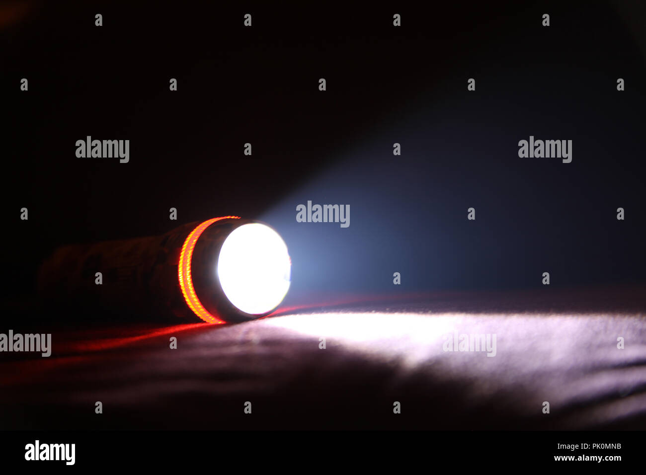 Light Beam from Electric Flashlight Stock Photo - Alamy
