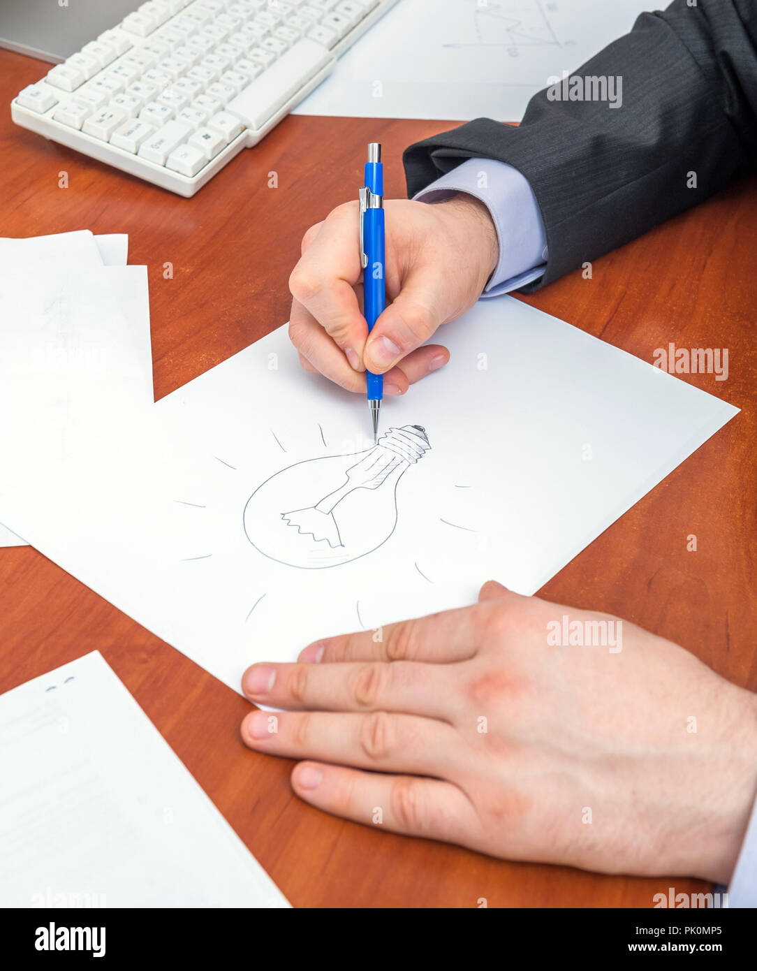 Businessman signs documents hi-res stock photography and images - Alamy