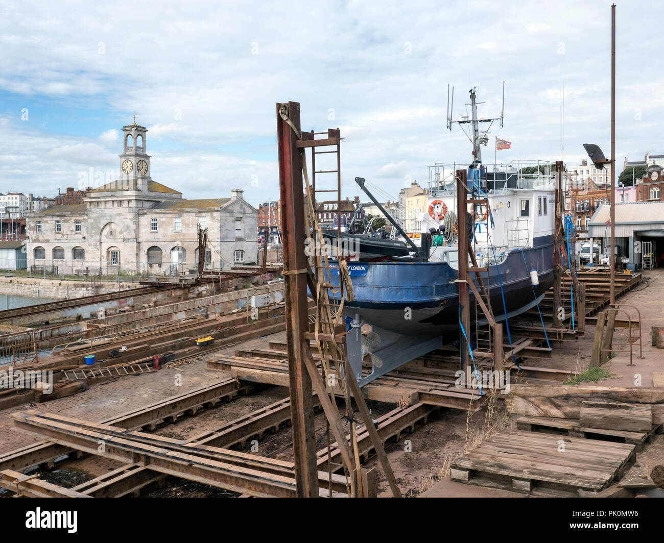 Ship repair slipway in Ramsgate Royal Harbour,The clock house in the ...
