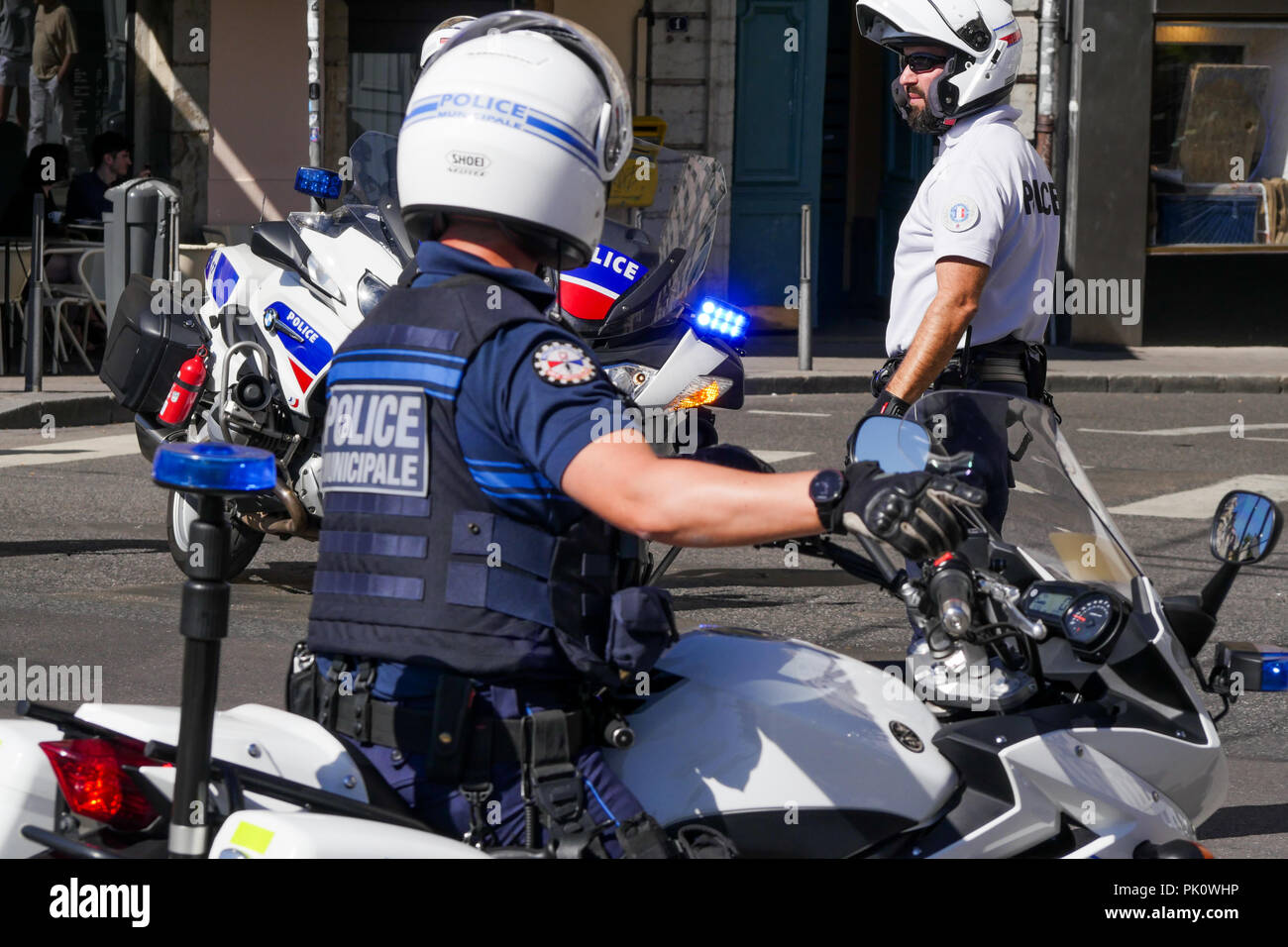 Motorcyclists police officers look upon political demo, Lyon, France ...