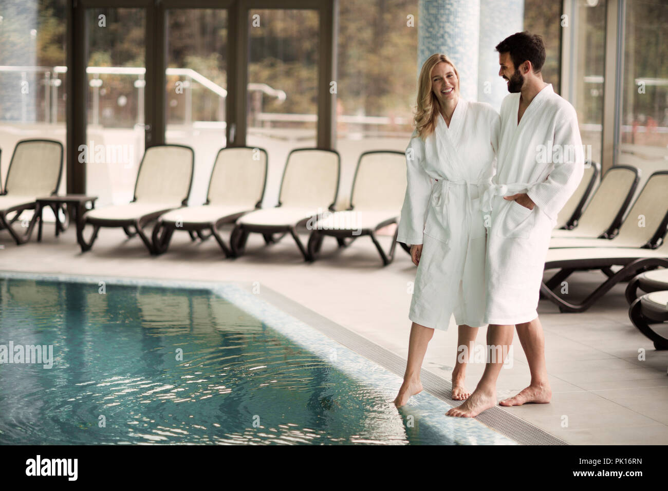 Portrait of attractive couple in spa center Stock Photo - Alamy