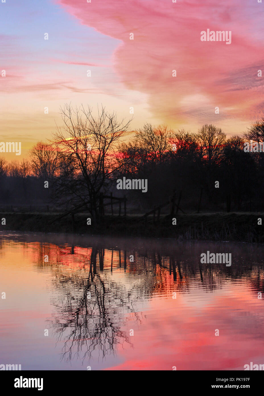Coloured sky over the river Stock Photo - Alamy