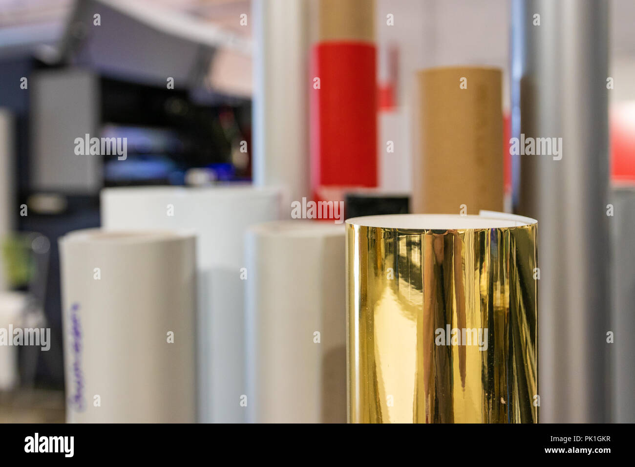 Professional printing facility, details of vertical, golden, shiny ...