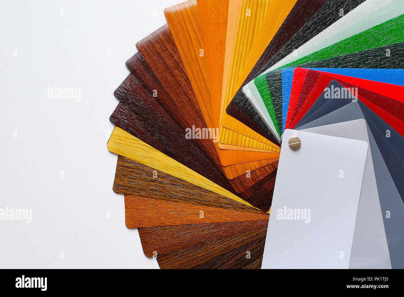 Samples of the colored lamination. Color palette on the table close-up ...