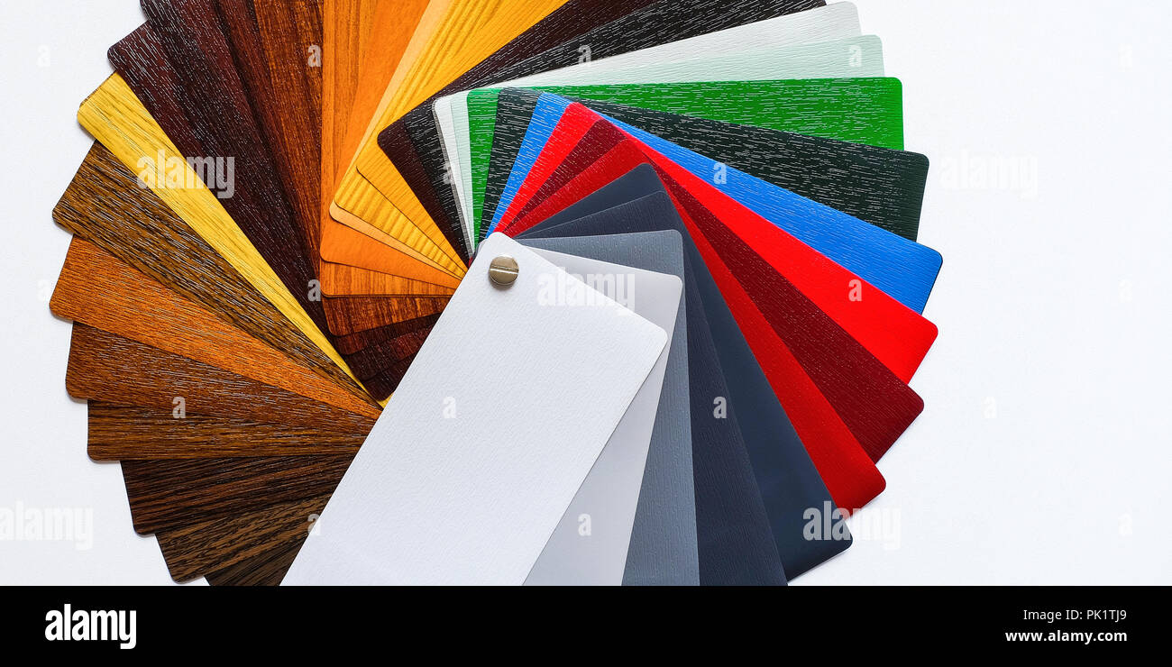 Samples of the colored lamination. Color palette on the table close-up ...