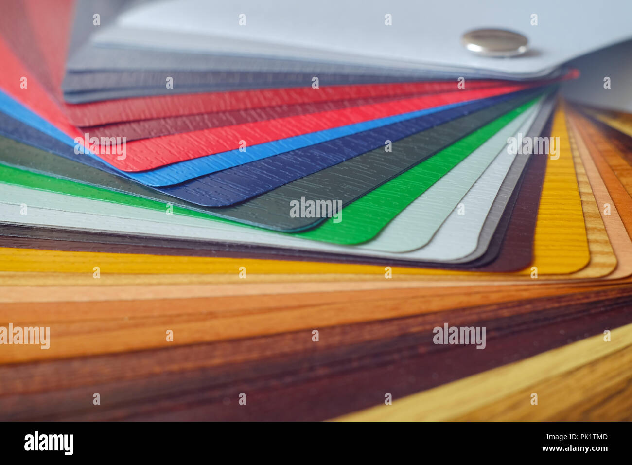 Samples of the colored lamination. Color palette on the table close-up ...
