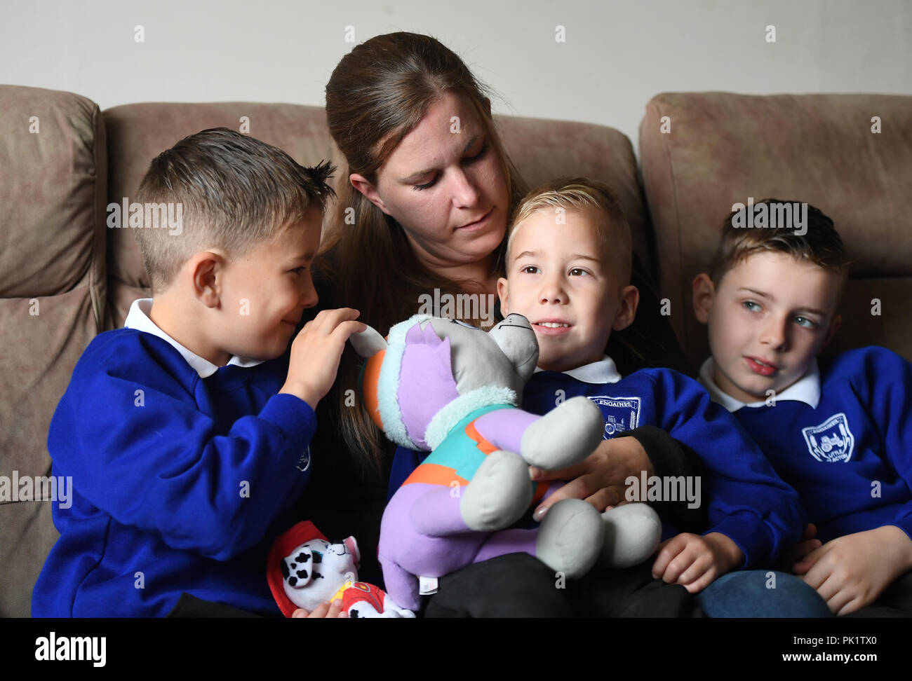 Four year old Alexander Pickering (centre), known as Xander, who has ...