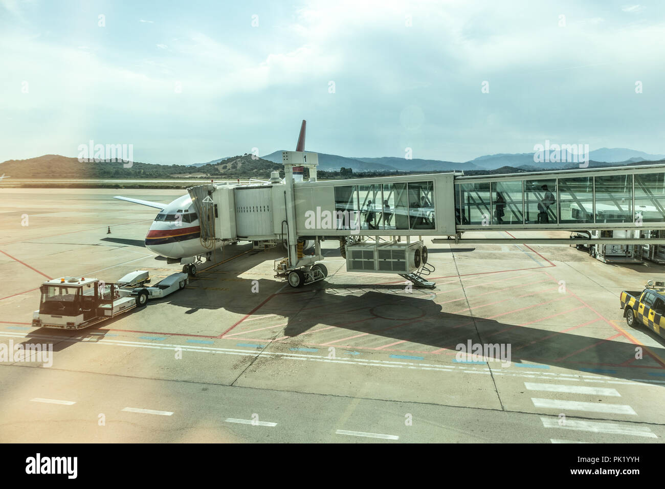 Airplane Boarding on the airport before departure Stock Photo - Alamy