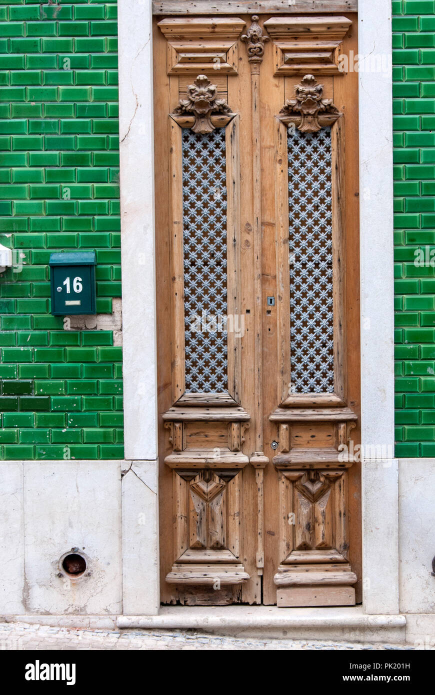 Traditional Carved Wooden Doors of Portuguese Tile Fronted Dwelling ... Traditional Carved Wooden Doors of Portuguese Tile Fronted Dwelling ...
