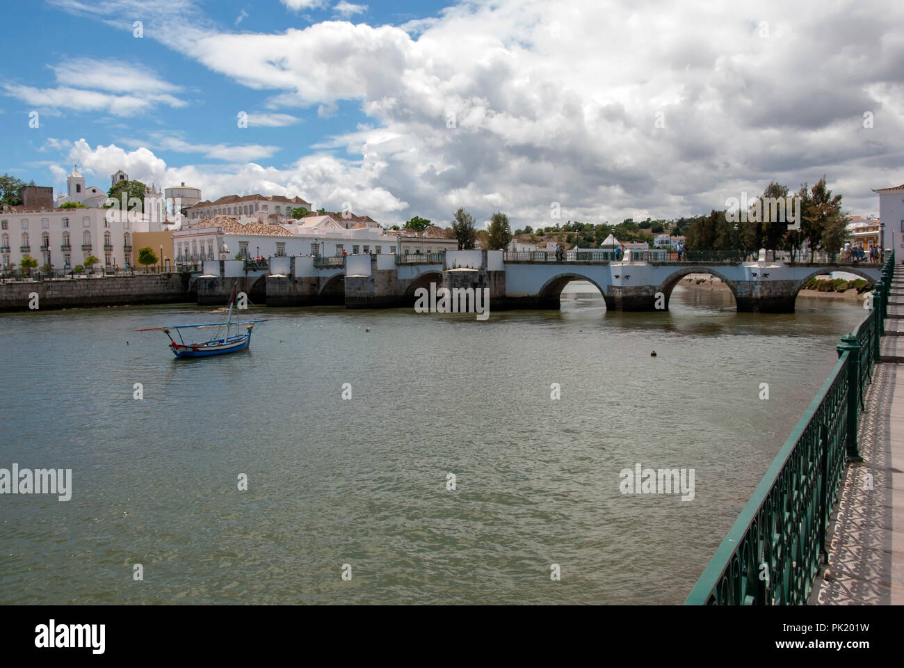 Traditional Portuguese Fishing Boat in front of the Roman Bridge in Rio ...