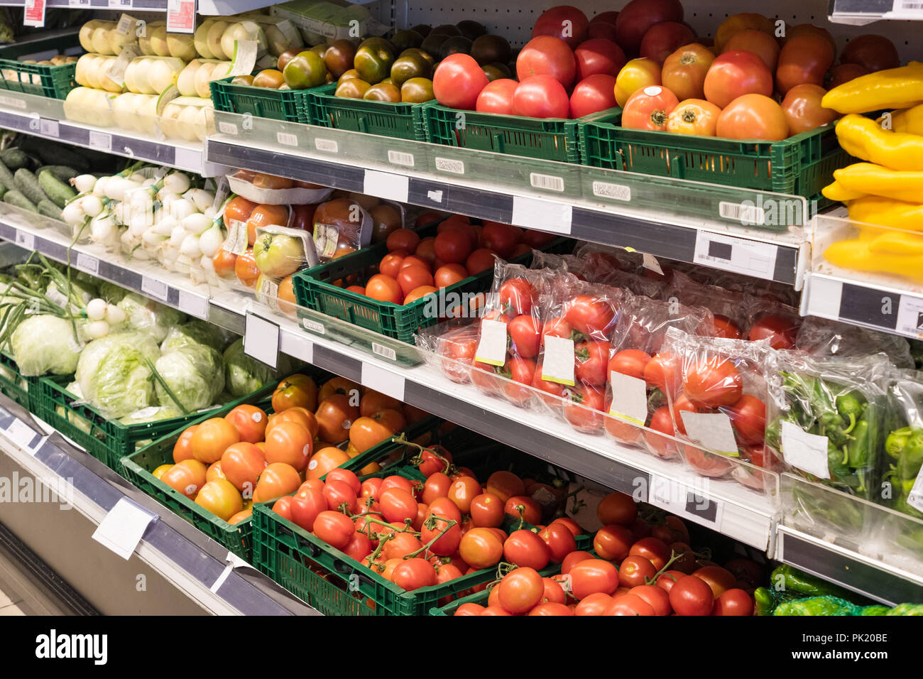 Fresh fruits and vegetables in supermarket. Market interior Stock Photo ...