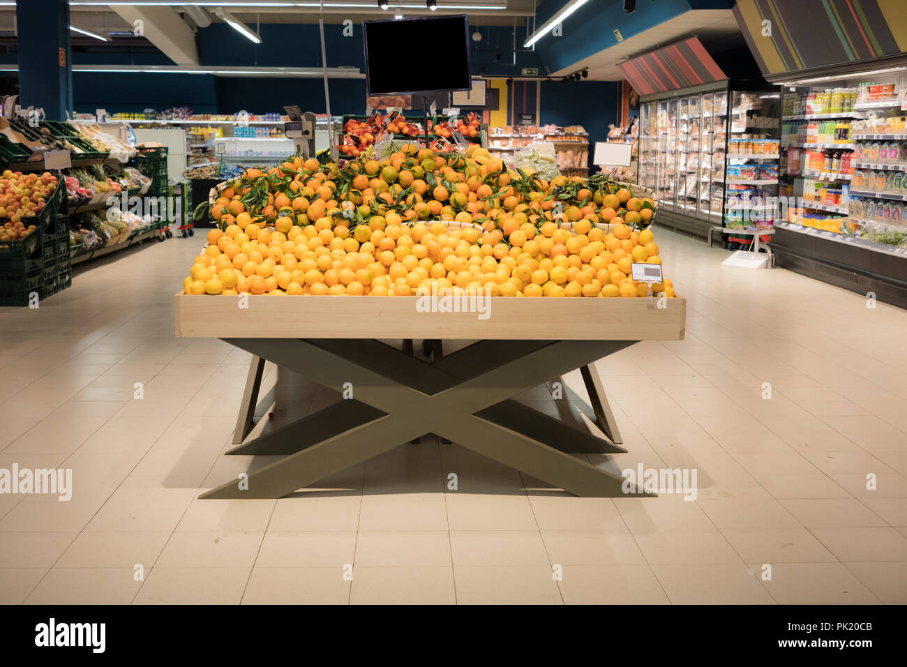 Fresh fruits and vegetables in supermarket. Market interior Stock Photo ...