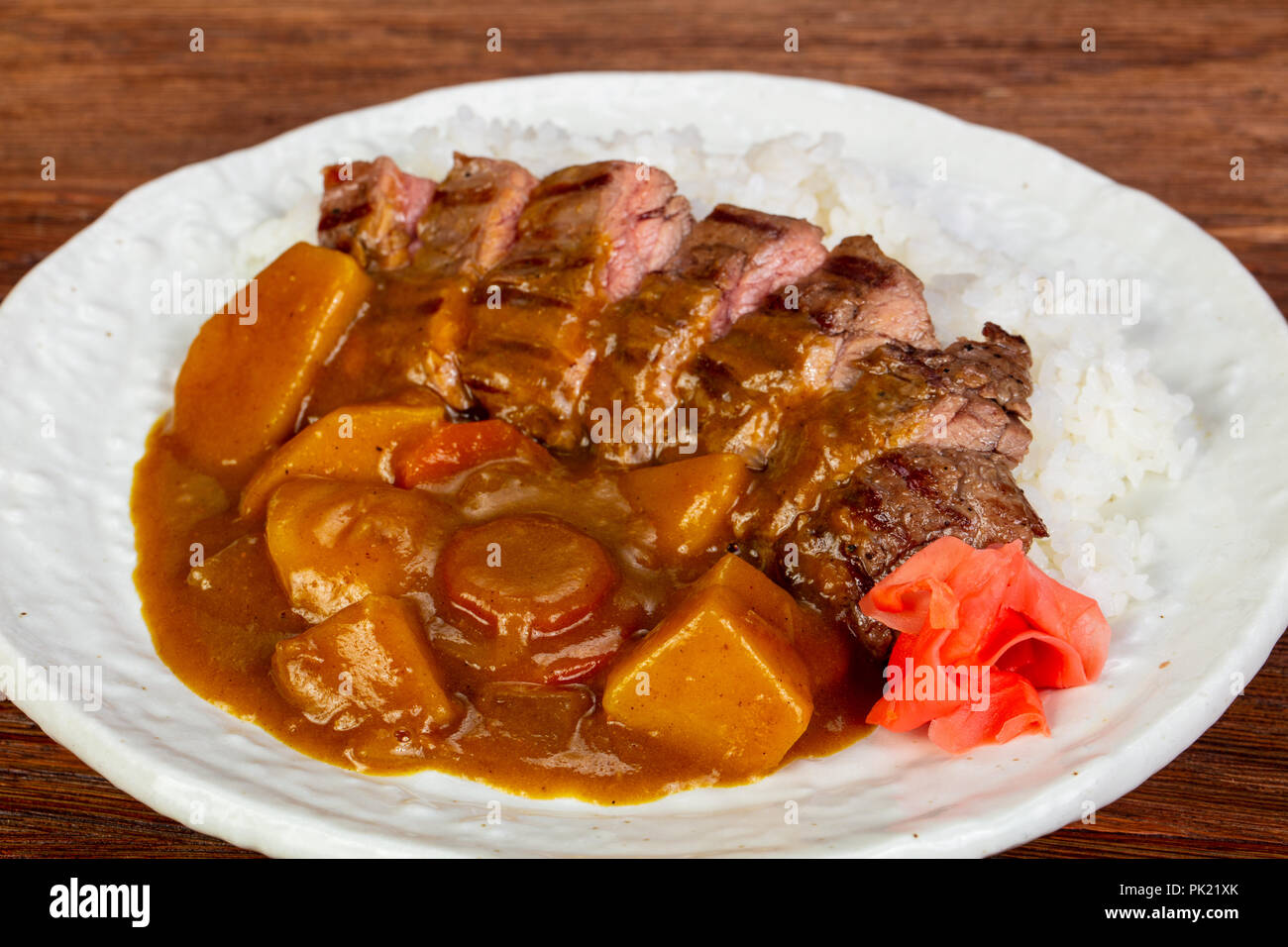 Curry with chili, beef, rice Stock Photo - Alamy