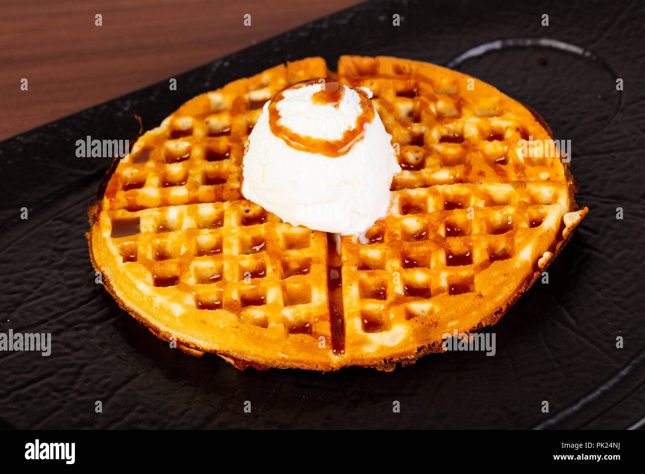 Viennese waffles with sweet syrope Stock Photo - Alamy