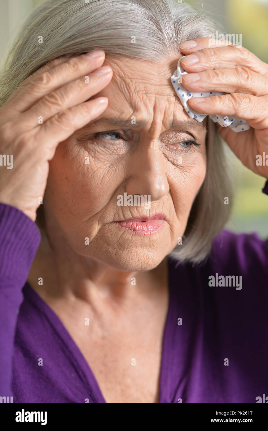 Elderly woman grey purple hair hi-res stock photography and images - Alamy