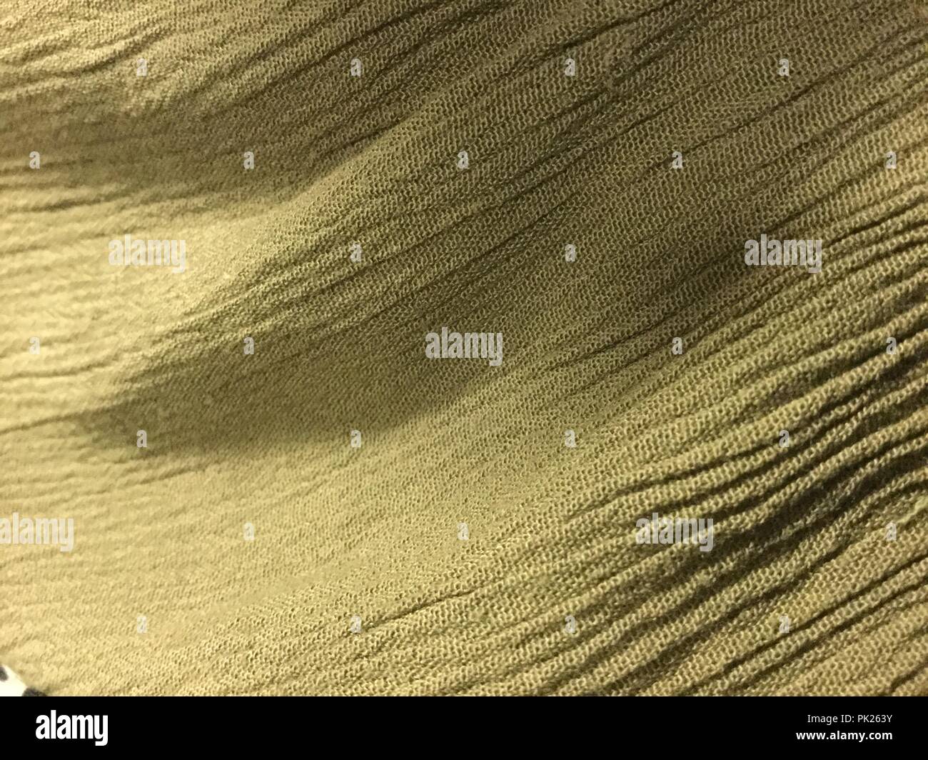 Green fabric with waves and surface textures, shadows Stock Photo - Alamy