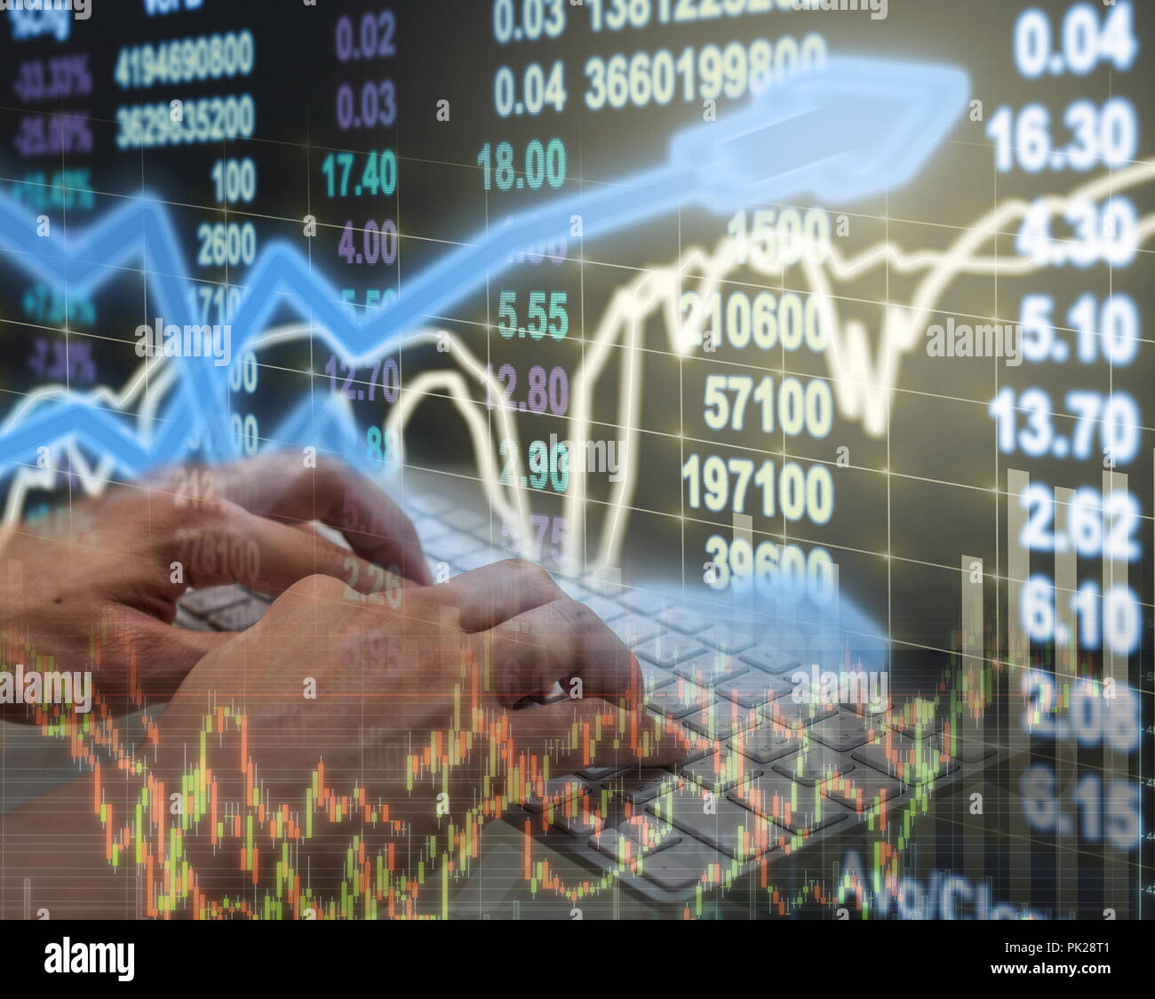 Hand using keyboard over the Stock market exchange trading chart ...