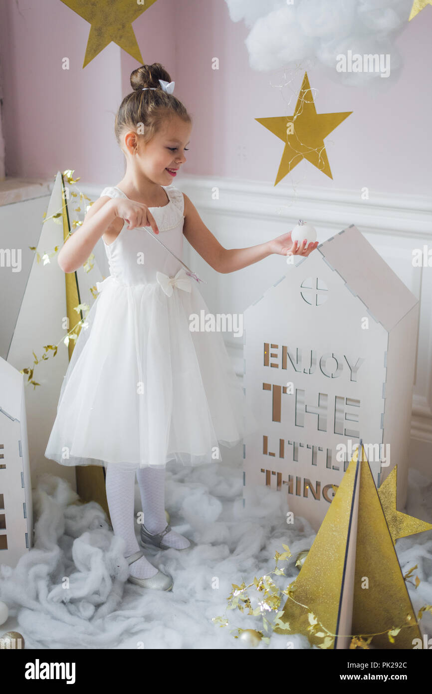 Dreams about being princess comes true. little girl in fairy decoration ...