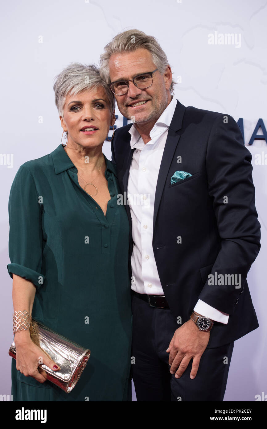 Birgit SCHROWANGE, left, presenter, and Frank Sporthelfer, half figure ...