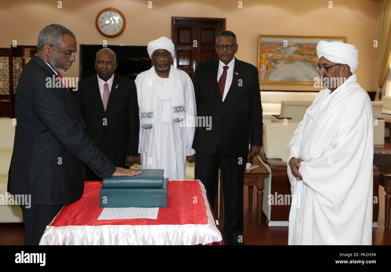 Khartoum, Sudan. 10th Sep, 2018. Mutaz Mussa (1st L) is sworn in as ...