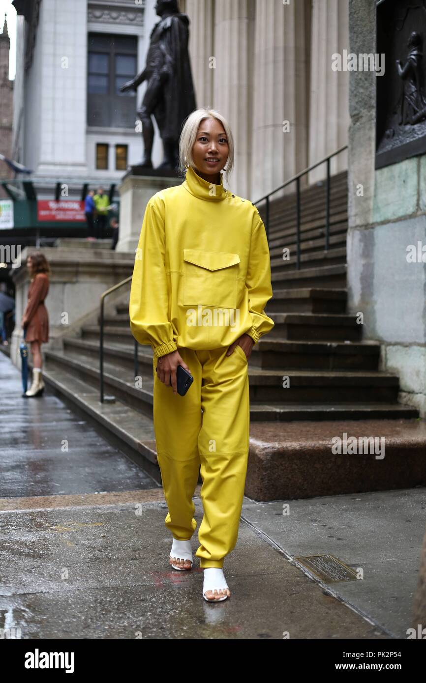 Blogger Vanessa Hong posing on the street outside the Tibi show during ...