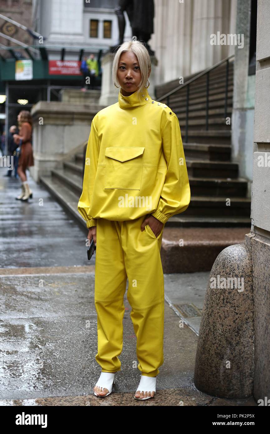 Blogger Vanessa Hong posing on the street outside the Tibi show during ...