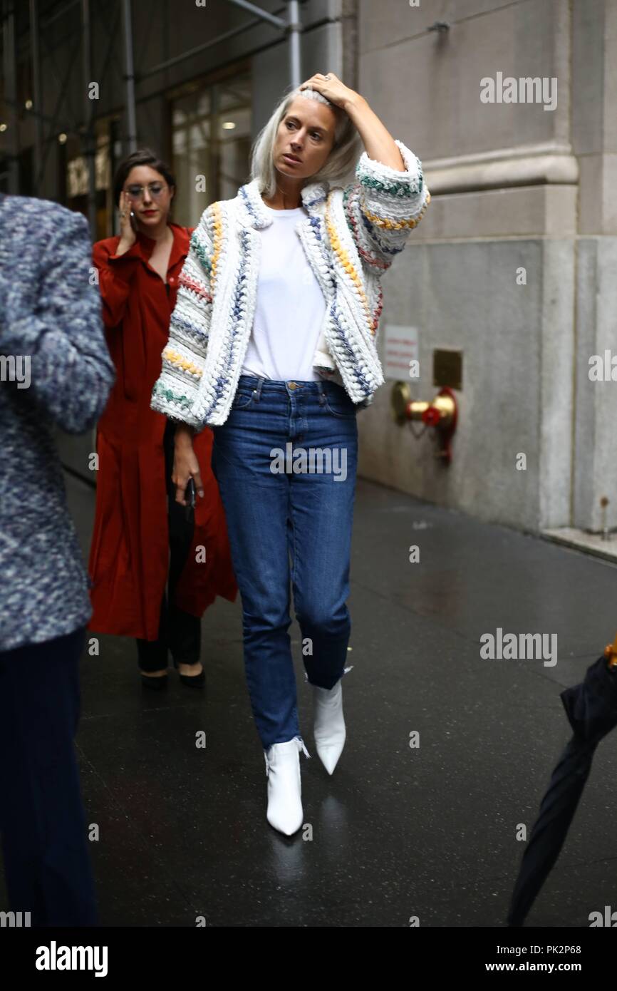 Sarah Harris, Deputy Editor Vogue UK, posing on the street outside the ...