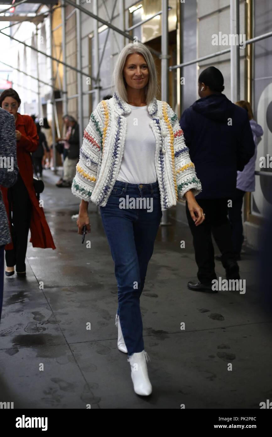 Sarah Harris, Deputy Editor Vogue UK, posing on the street outside the ...