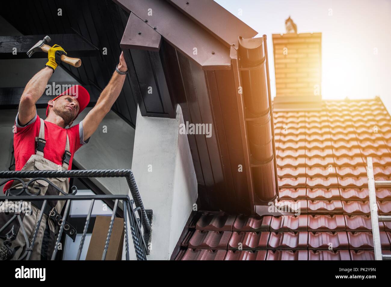 Finishing Ceramic Roof Construction by Caucasian Roofer in His 30s ...