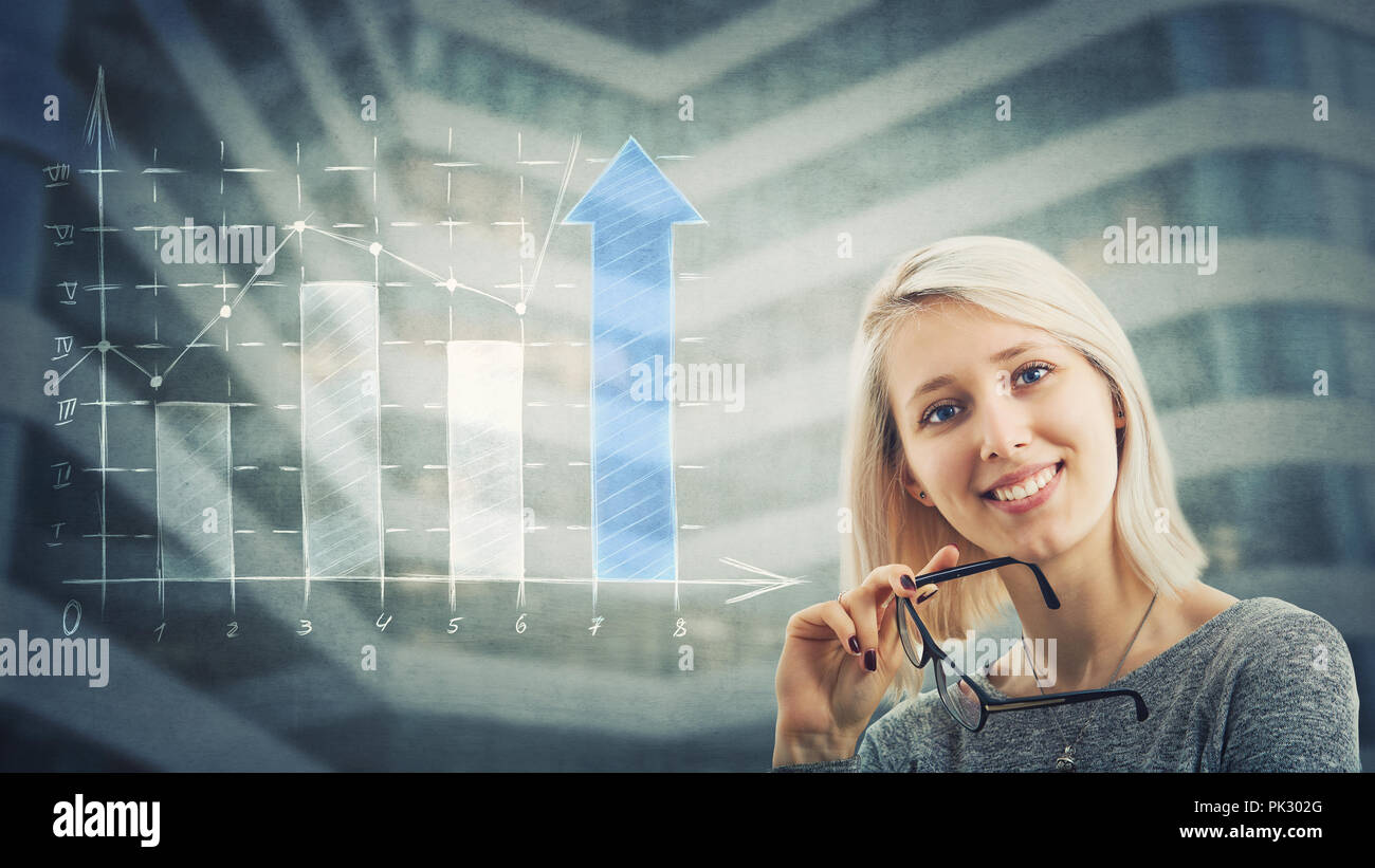 Pretty young woman analyst holding glasses in her hand and a rising ...