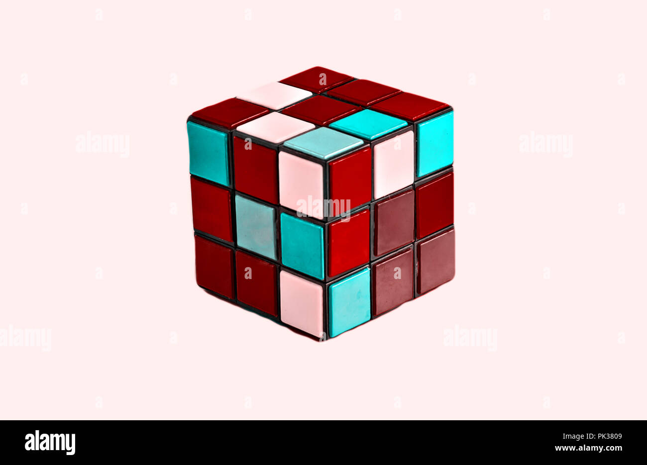Folding multi-colored cube isolated Stock Photo - Alamy