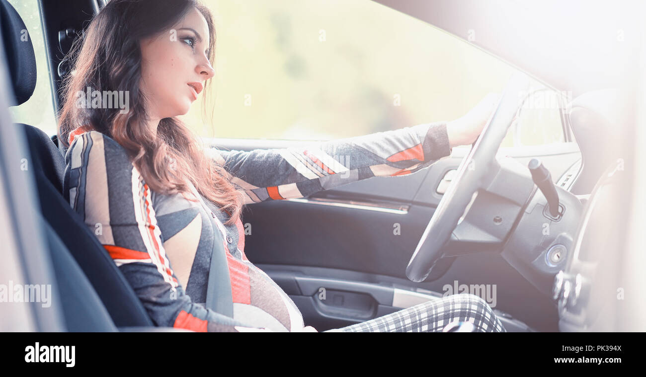 Girl driving a car bad emotions Stock Photo - Alamy