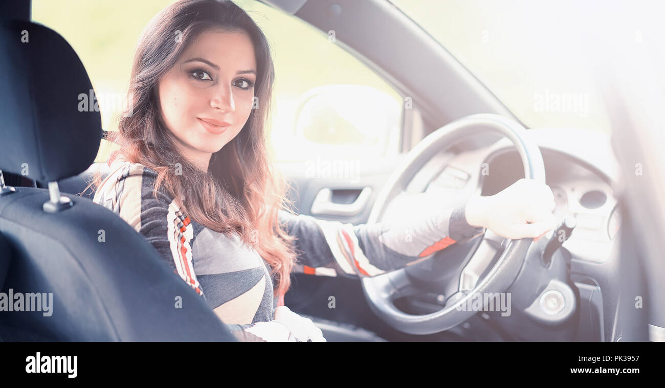 Girl driving a car bad emotions Stock Photo - Alamy