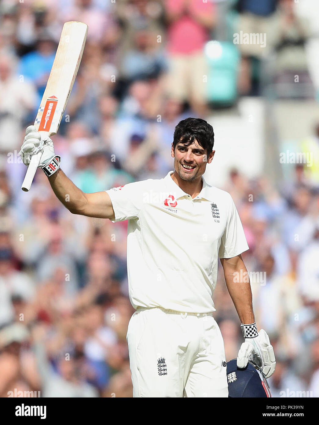 England's Alastair Cook celebrates reaching his century during the test ...