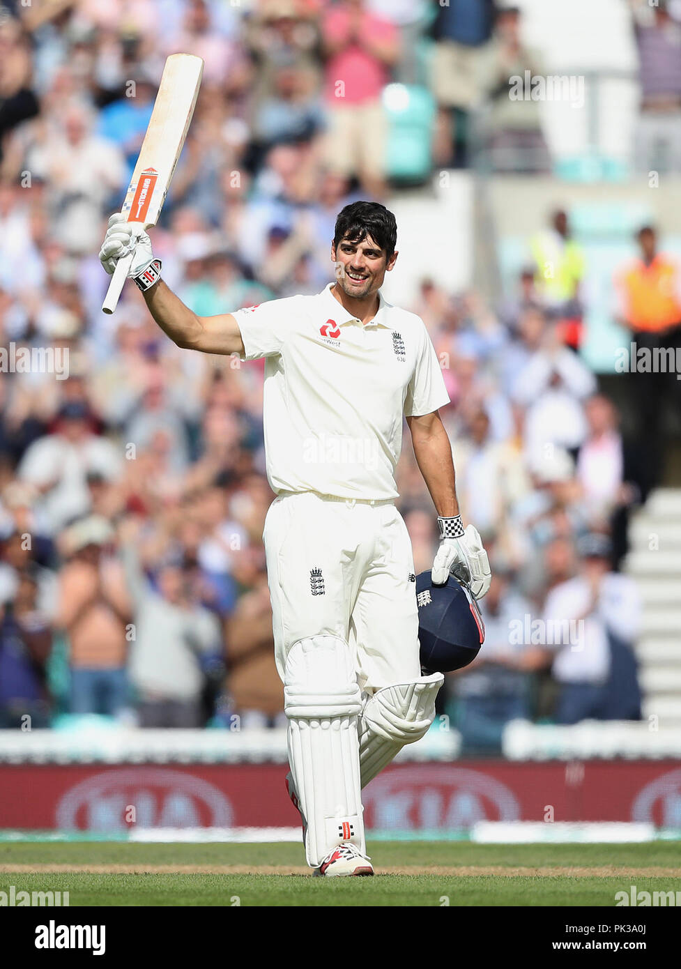 England's Alastair Cook celebrates reaching his century during the test ...