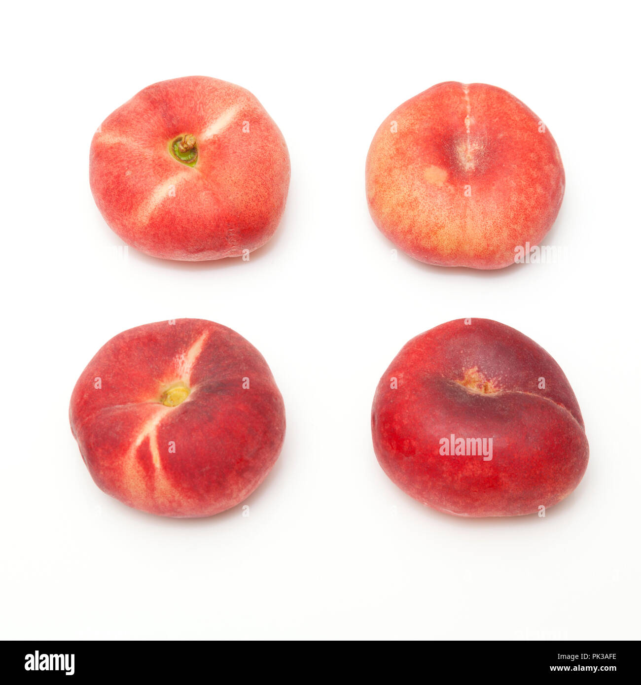 Flat peaches Saturn peach isolated on a white studio background Stock ...