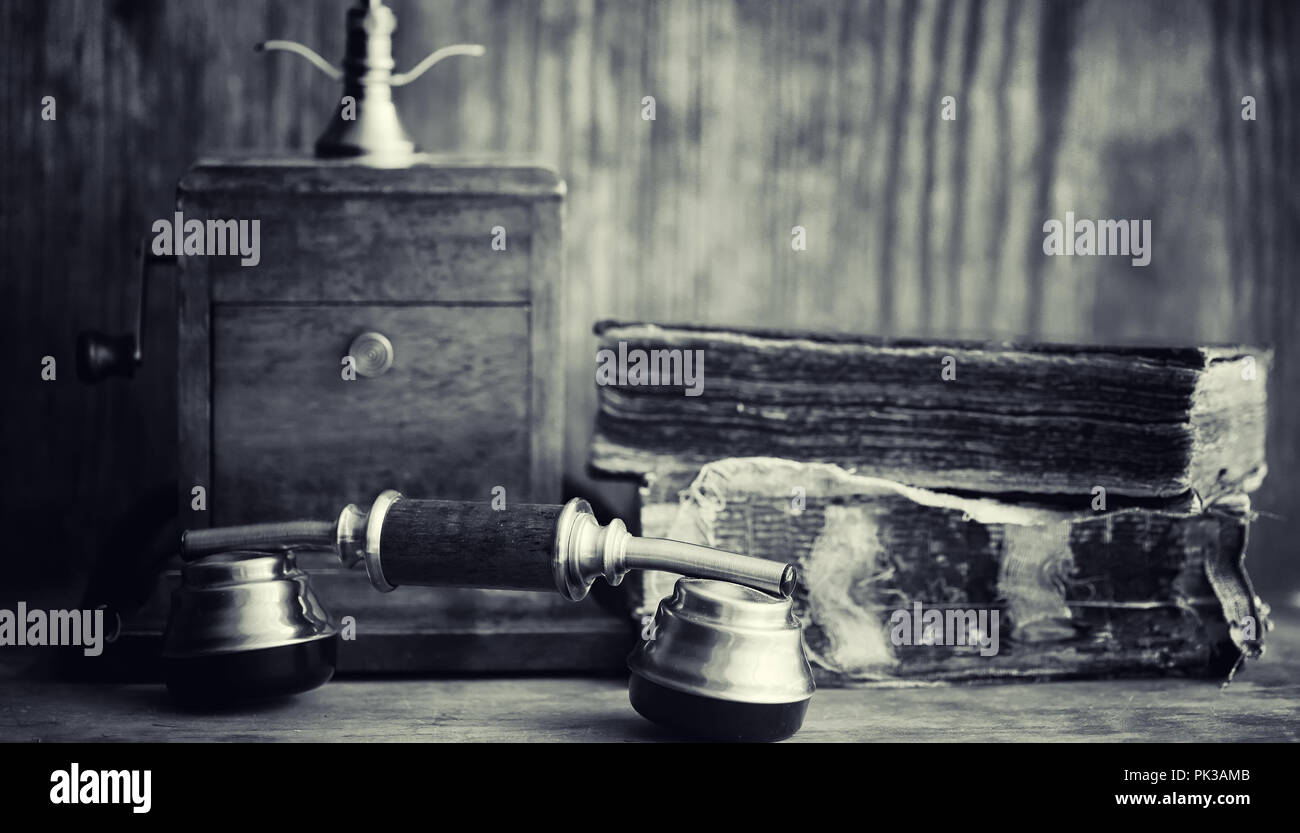 Old telephone and retro book on the desk. The phone of the past Stock ...