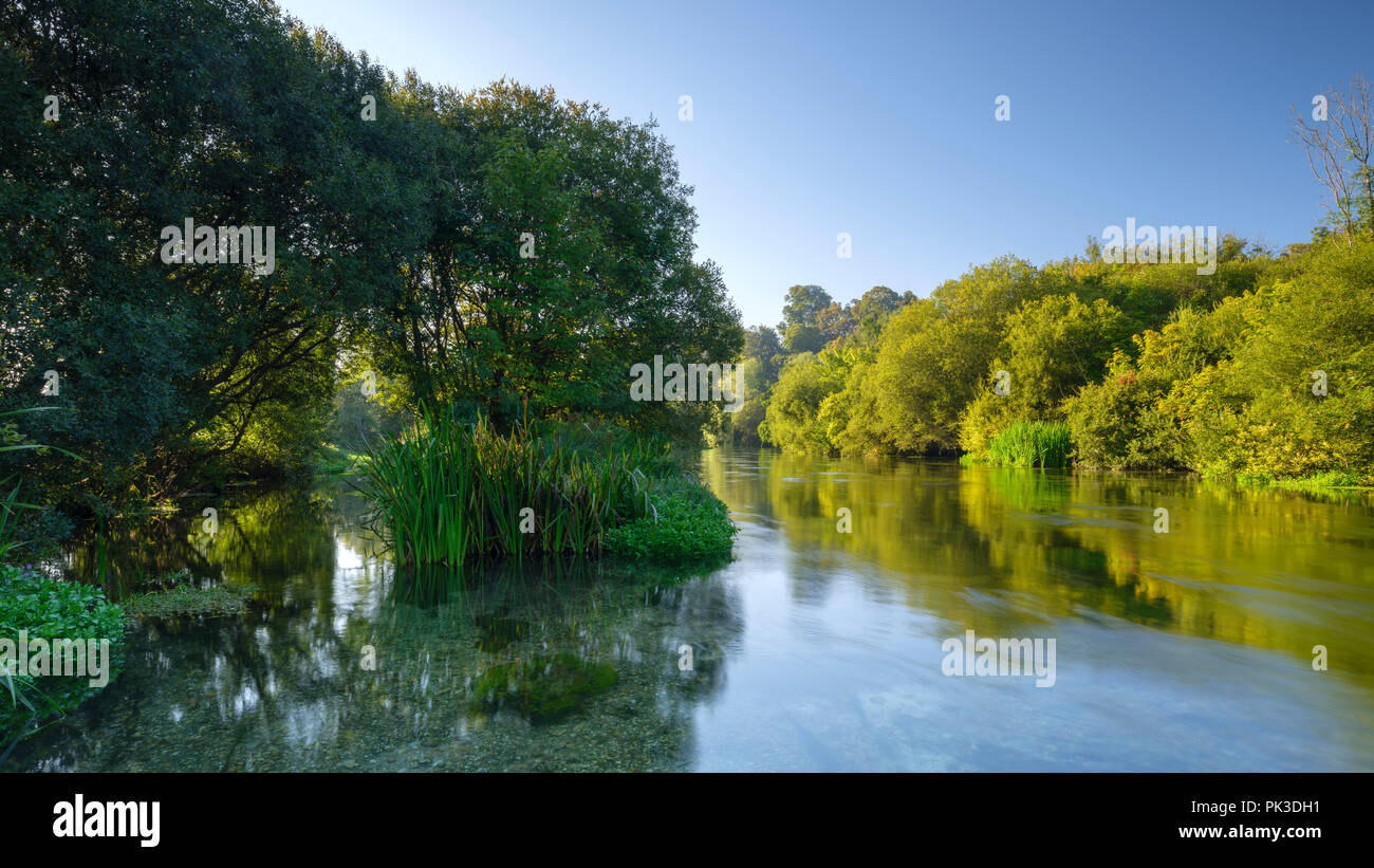 Autumn sunrise on the River Itchen - a famous chalk bed stream renowned ...