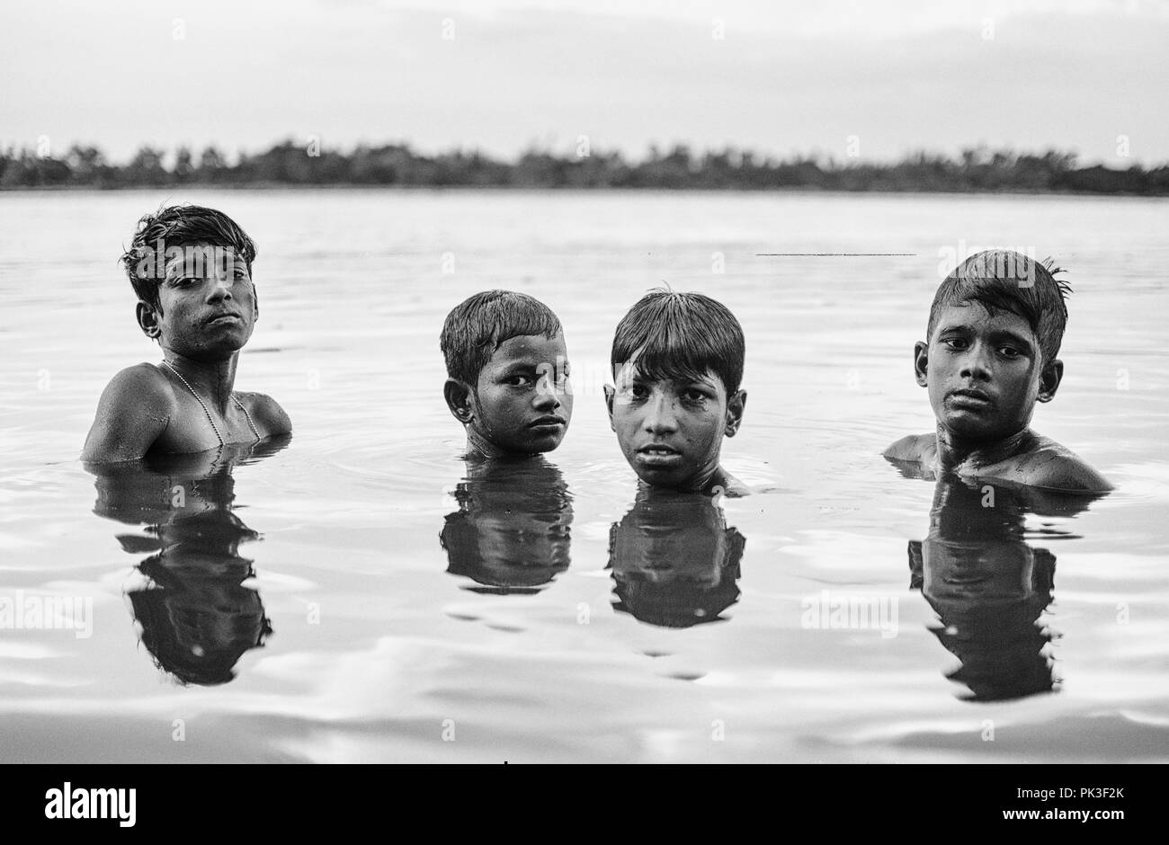 Kids in river Stock Photo - Alamy