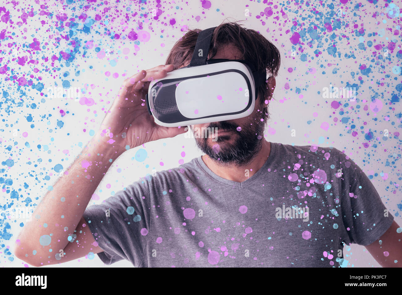 Virtual reality immersion, man wearing VR headset Stock Photo - Alamy