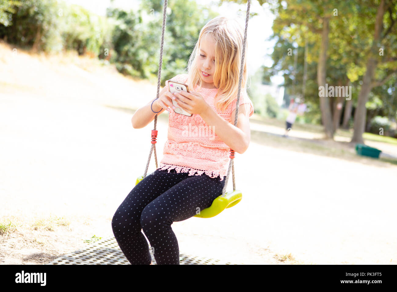 Children using iPad and iPhone Stock Photo - Alamy