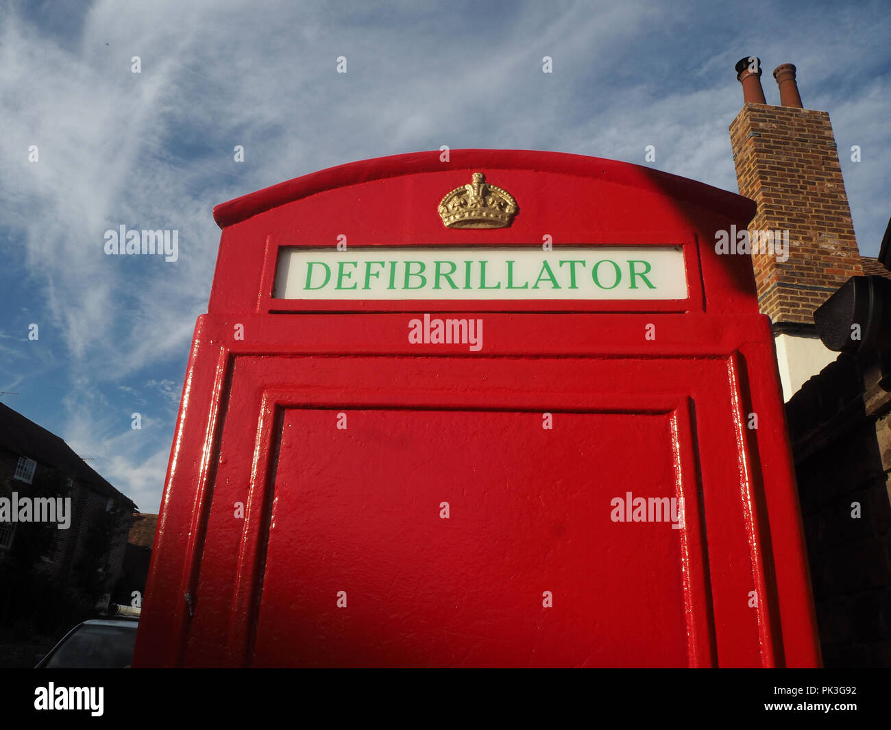 Defibrillator red phone box Stock Photo - Alamy